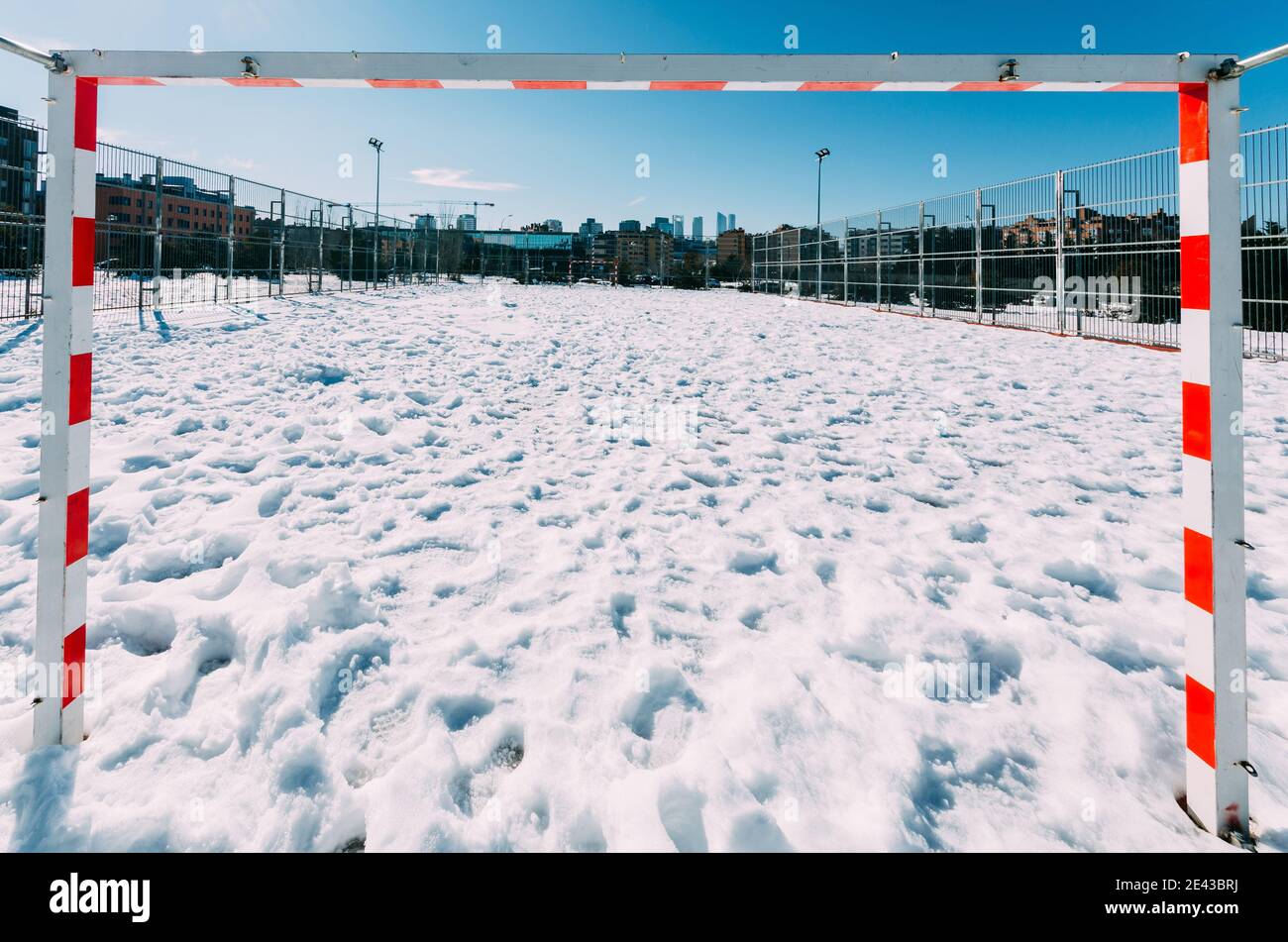 Football field covered with snow Stock Photo - Alamy