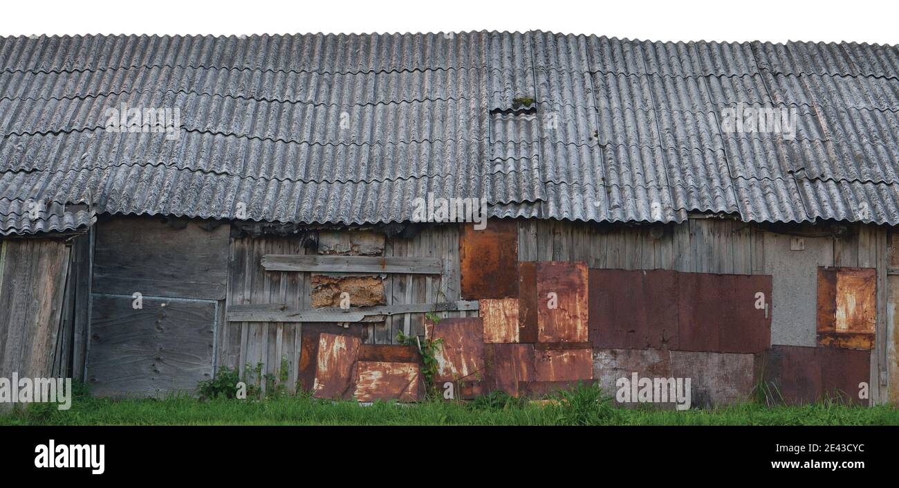 Old aged wooden shack grey plated wood boarding hut wall rusted metal ...