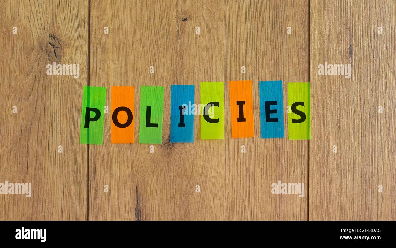 Policies symbol. Concept word 'policies' on colored papers on a ...