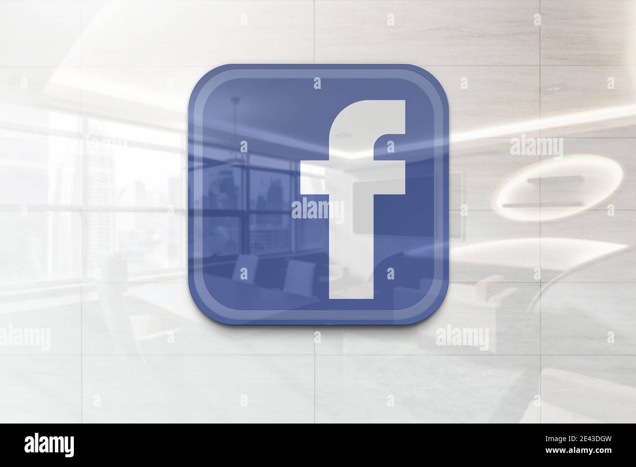 facebook logo on reflective business wall plaque Stock Photo - Alamy