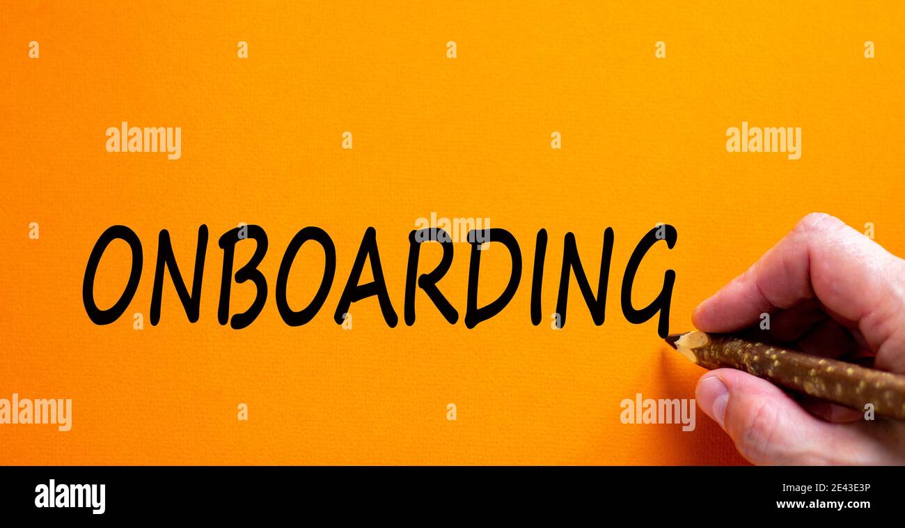 Onboarding symbol. Businessman writing the word 'onboarding', isolated ...