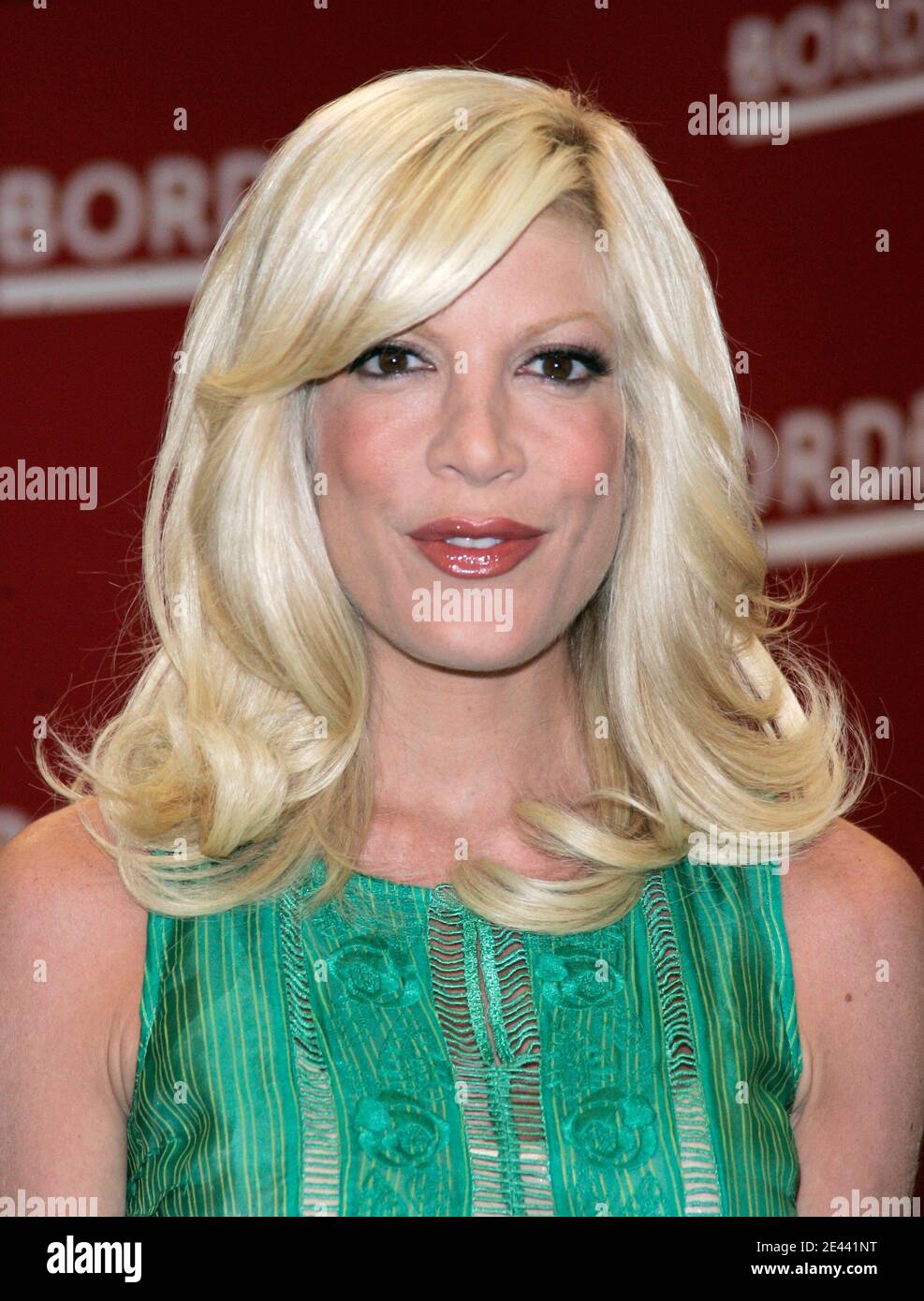 Actress Tori Spelling poses before signing copies of 'Mommywood' at ...