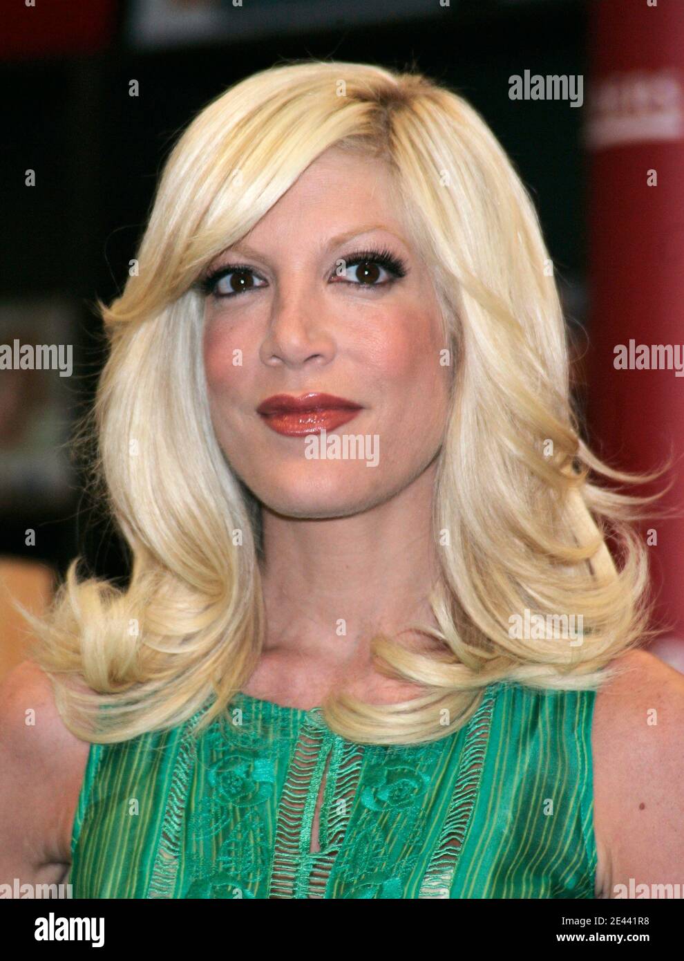 Actress Tori Spelling poses before signing copies of 'Mommywood' at ...