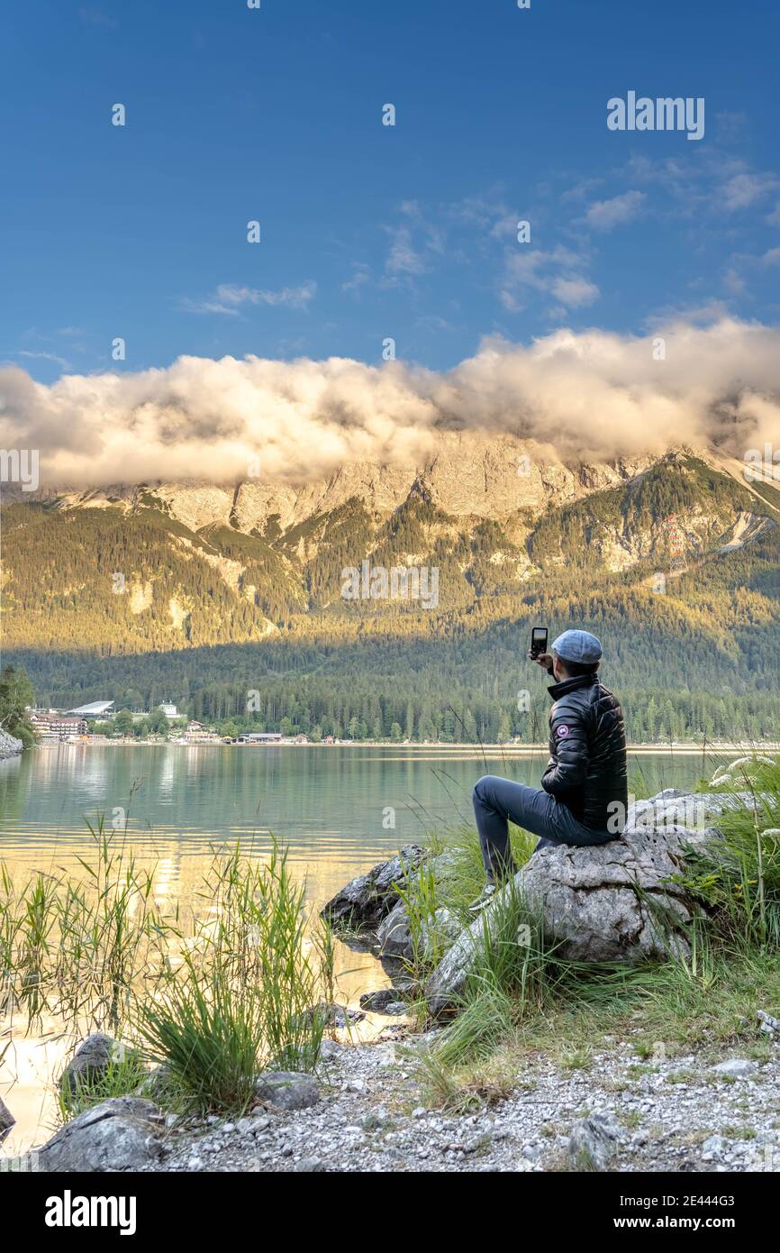 Grainau, Germany - Aug 5, 2020: Tourist take photo of heavy fog ...