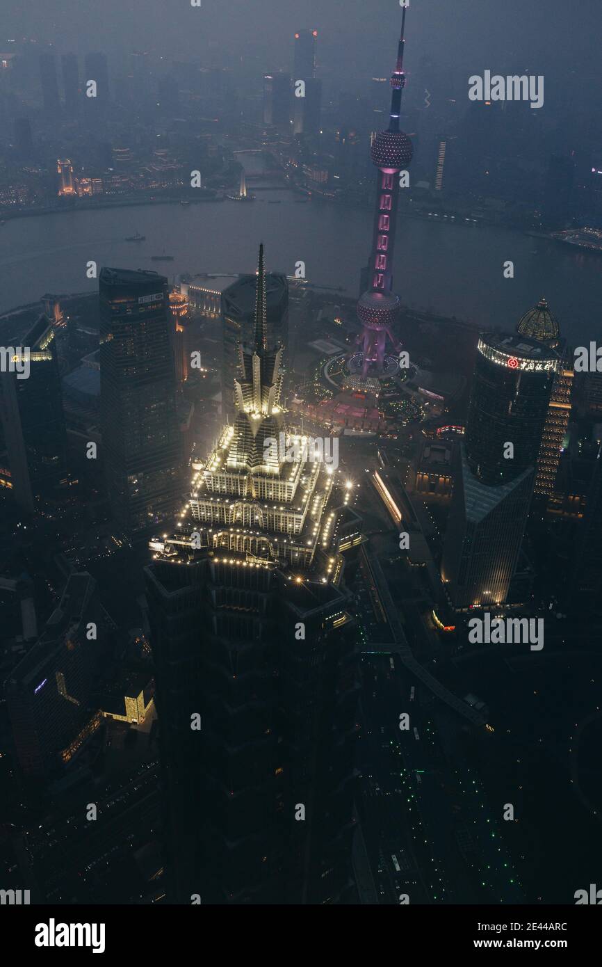 From above aerial view of modern district of Shanghai with illuminated ...