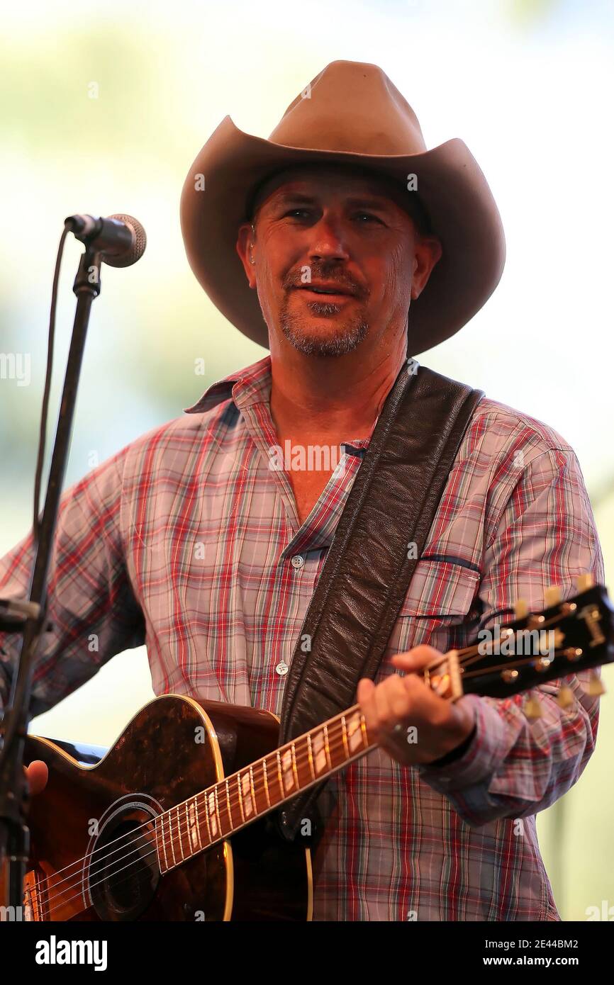 Kevin Costner performs live during the 2009 Stagecoach Country Music ...