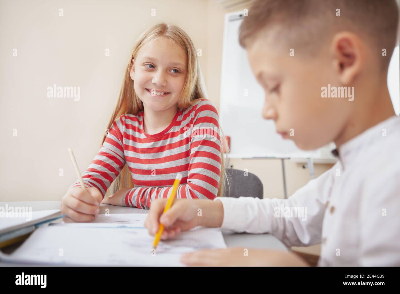 Love, affection, children concept. Lovely young blond haired girl ...