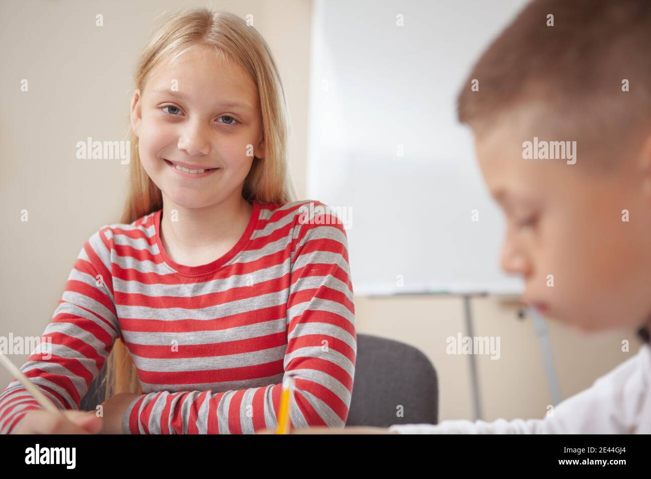 Happiness, children, kids concept. Cropped shot of lovely kids studying ...