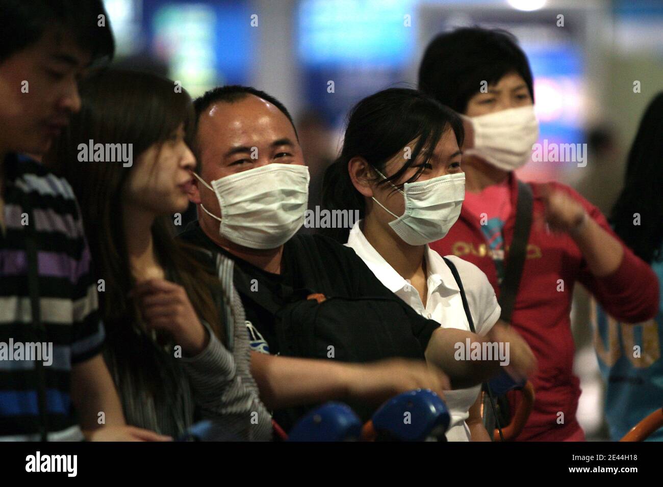 Japanese people wear masks in precaution against swine influenza when ...