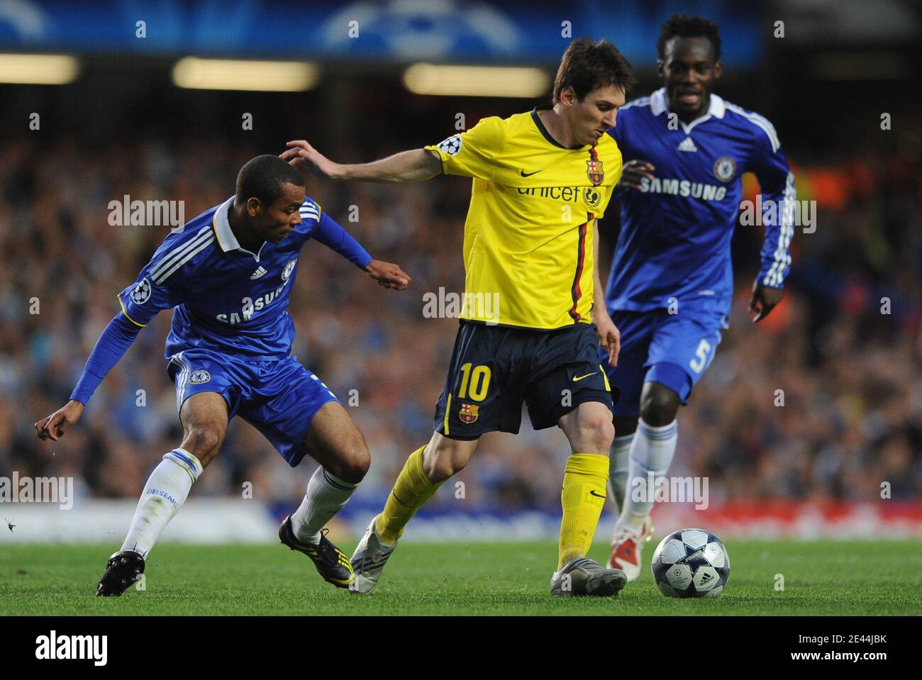 Barcelona's Lionel Messi challenges Chelsea's Ashley Cole and Michael ...
