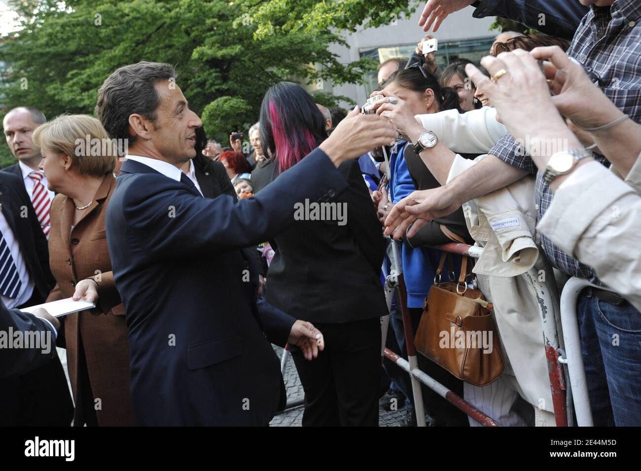 Angela Merkel Hands Glue