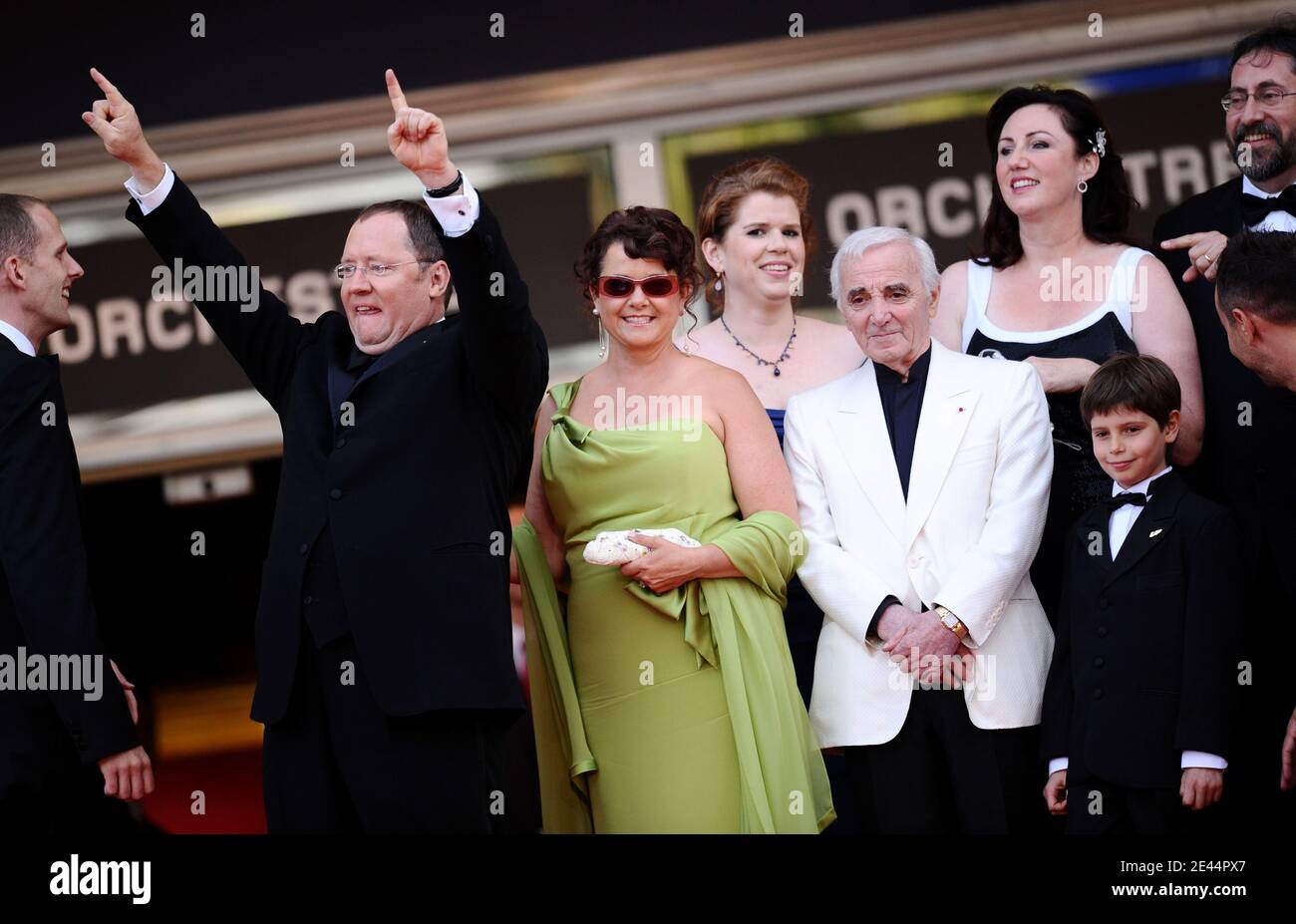 John Lasseter, Bob Peterson, Charles Aznavour and Tom Trouffier attend ...