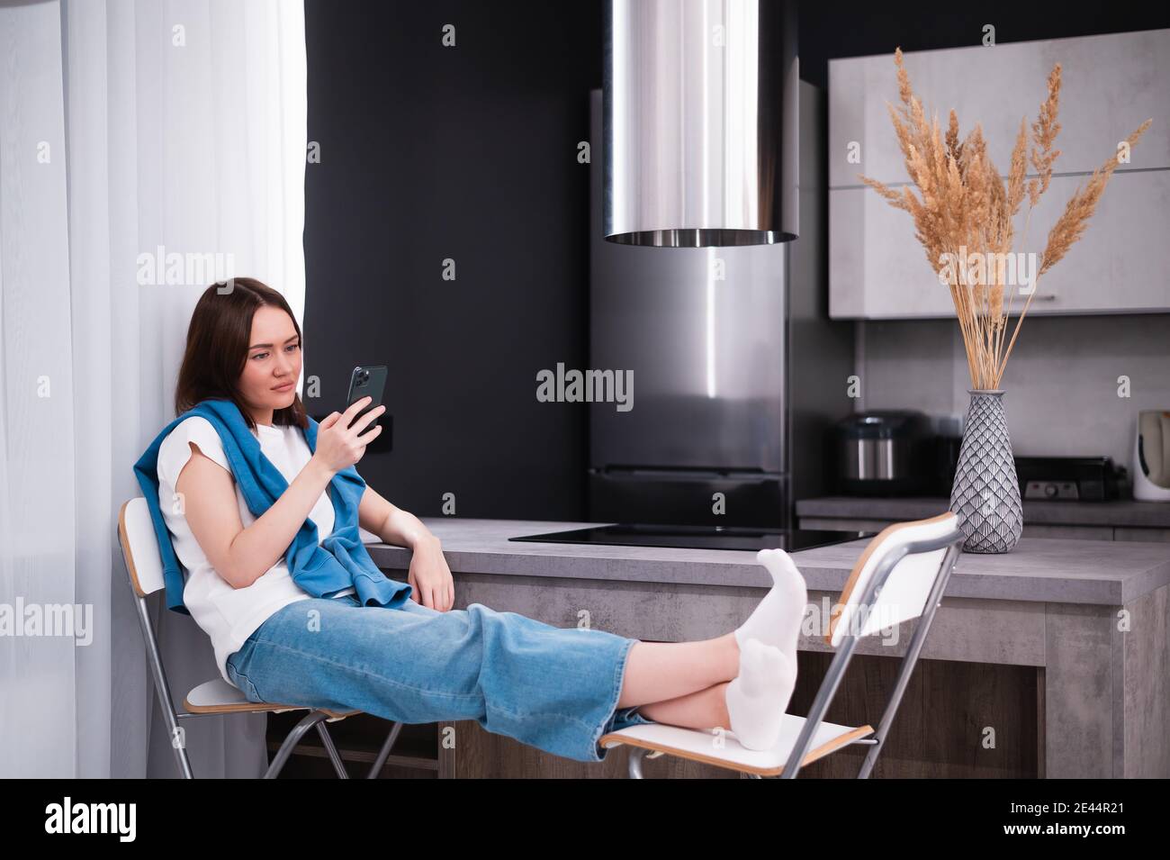 Woman coming home from work hi-res stock photography and images - Alamy