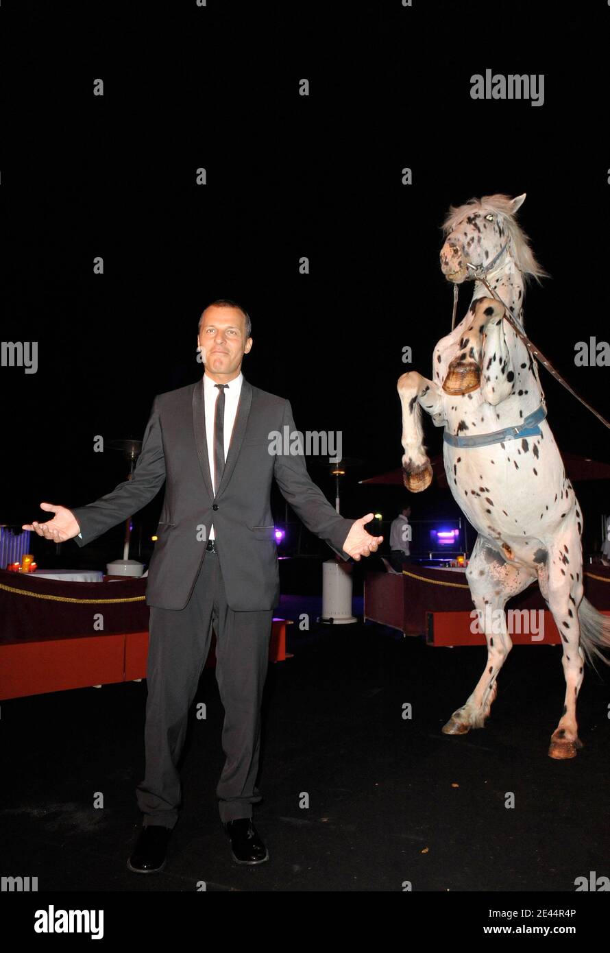 Jean Roch posing during a party held at the VIP Room in Cannes, France ...