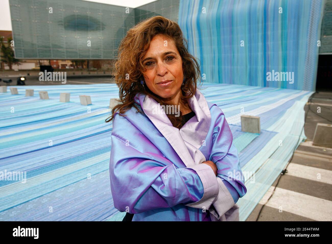 Italian artist Maria Dompe poses in front of her work 'La mer - la ...
