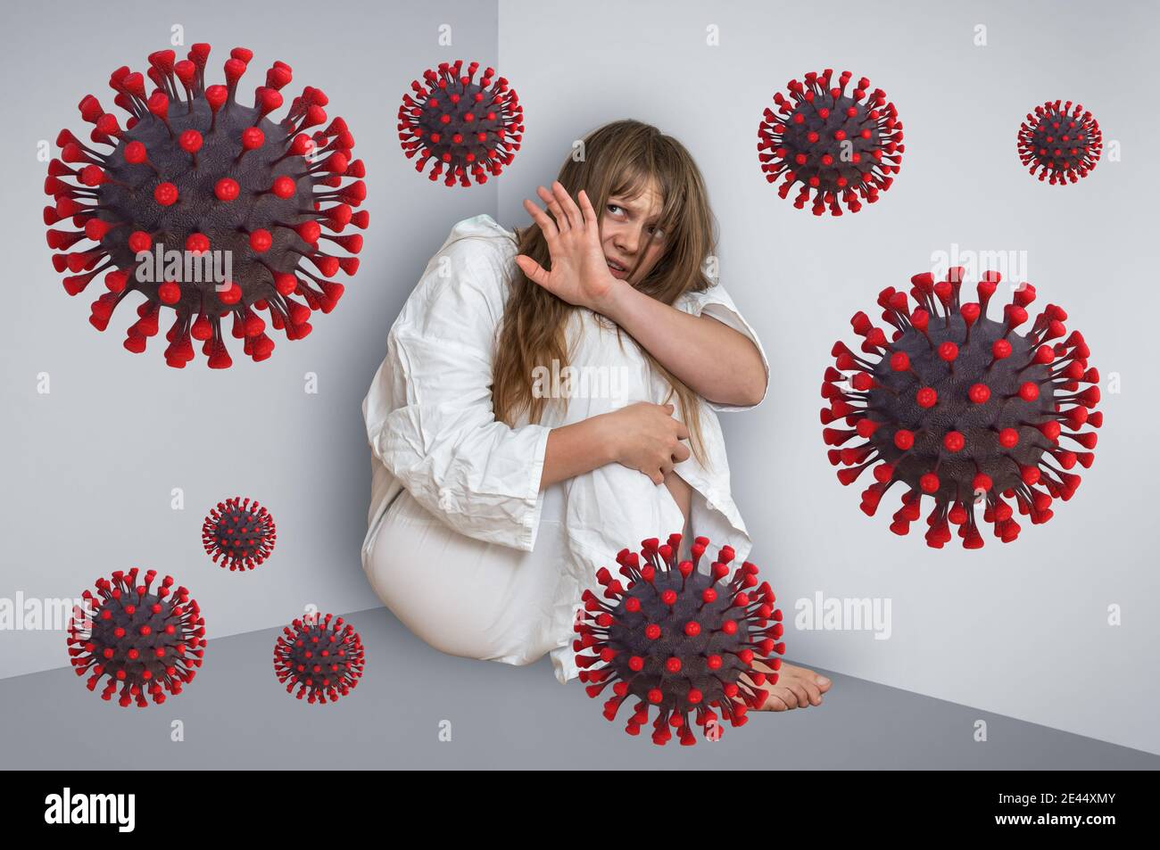 Scared woman in corner afraid of Coronavirus COVID-19 - 2019-nCoV virus ...