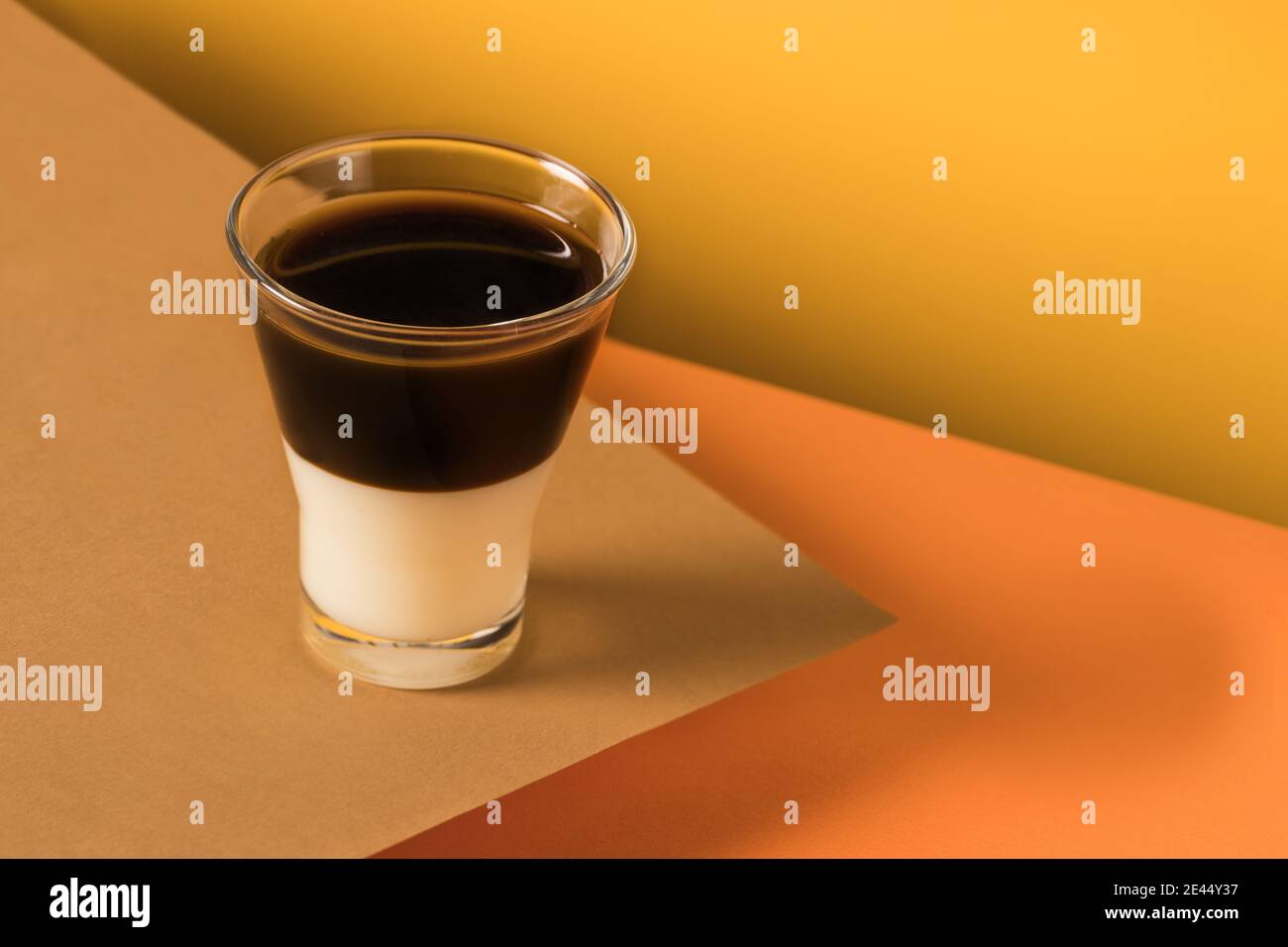 Layered coffee Bombon drink with espresso and sweetened condensed milk ...