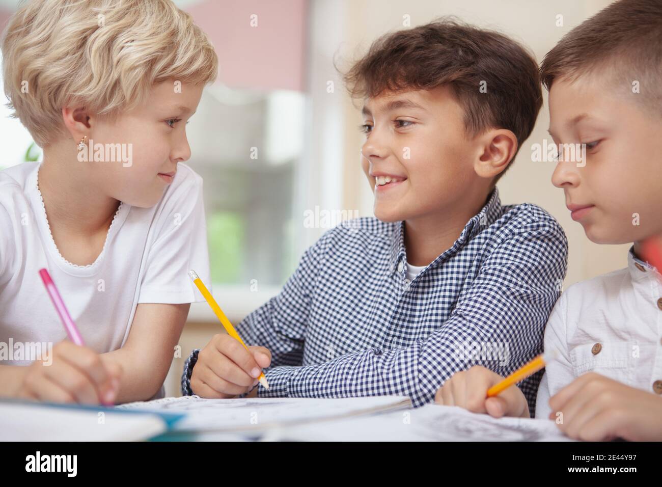 Children communicating classroom hi-res stock photography and images ...