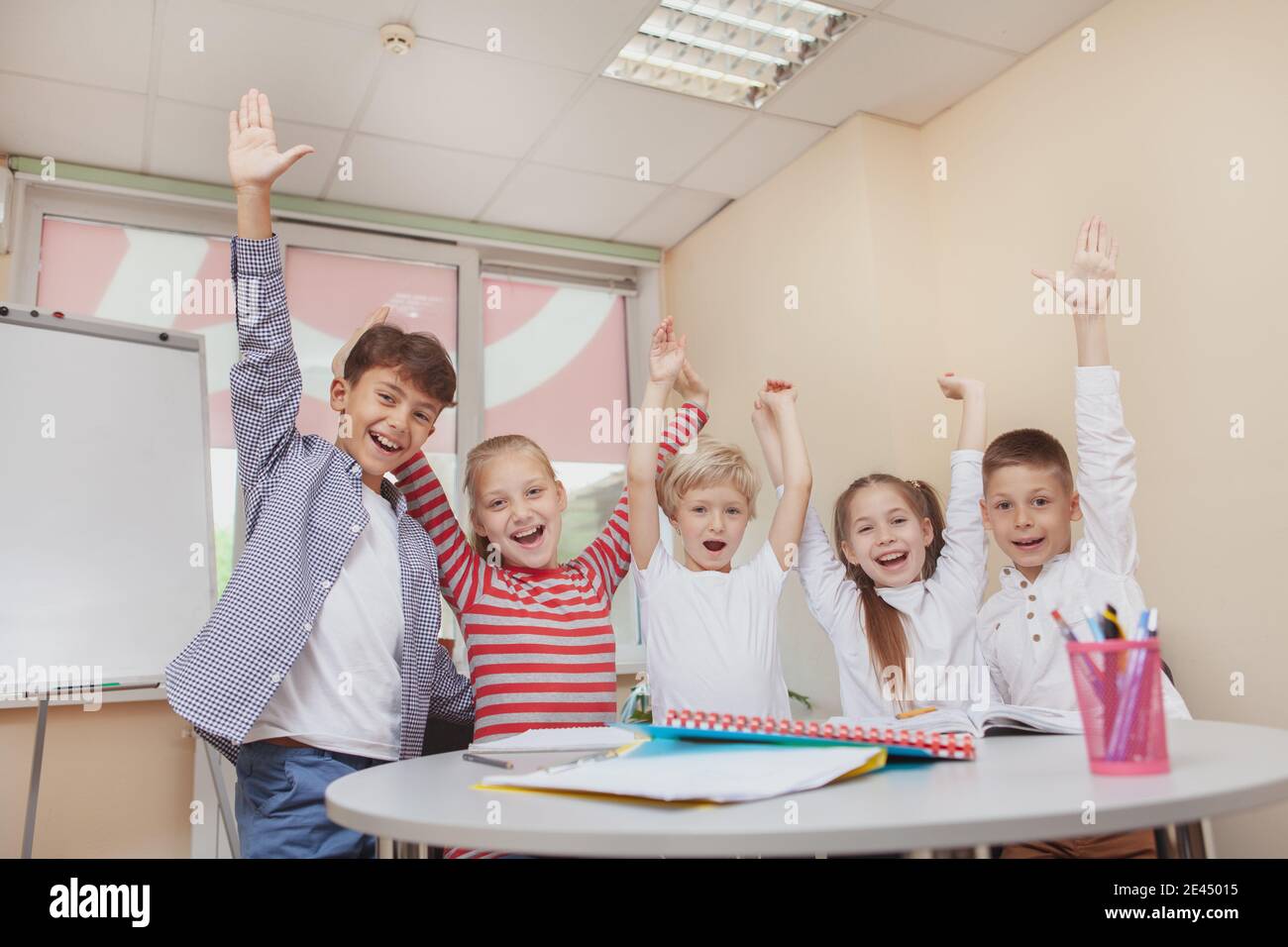 Happiness, childhood, friendship concept. Group of little elementary ...