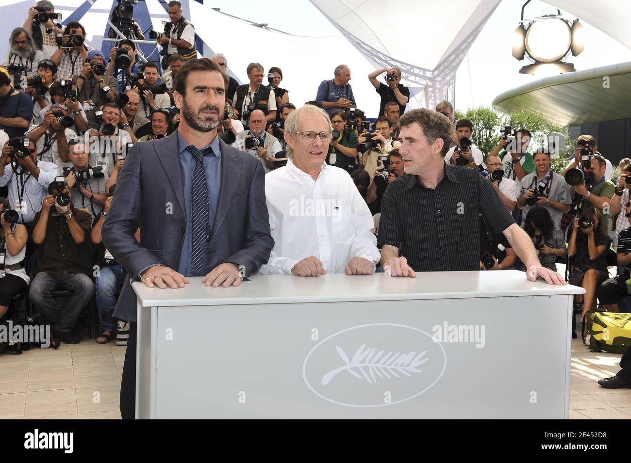 Actor Eric Cantona, director Ken Loach and actor Steve Evets attend the ...