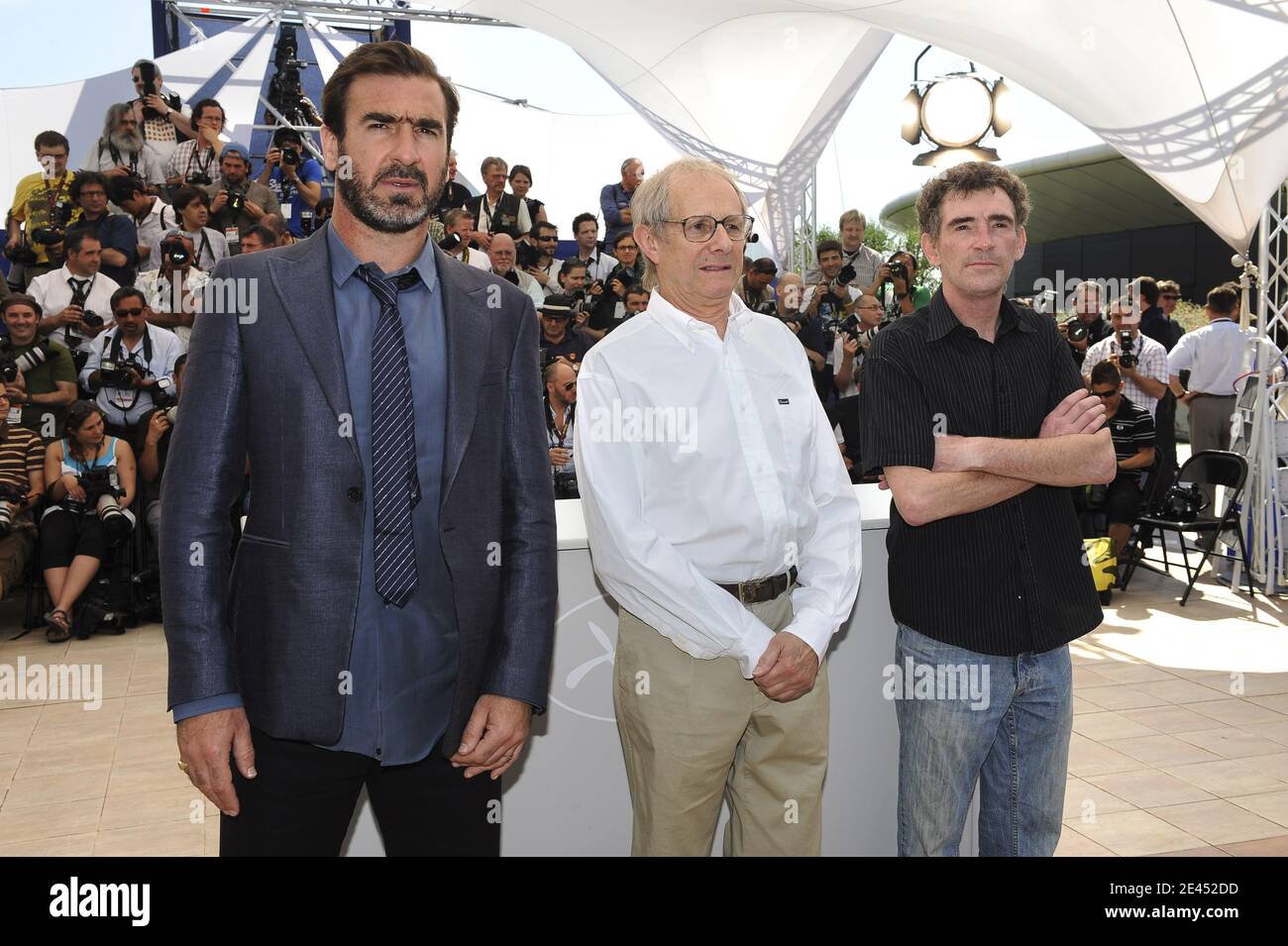 Actor Eric Cantona, director Ken Loach and actor Steve Evets attend the ...