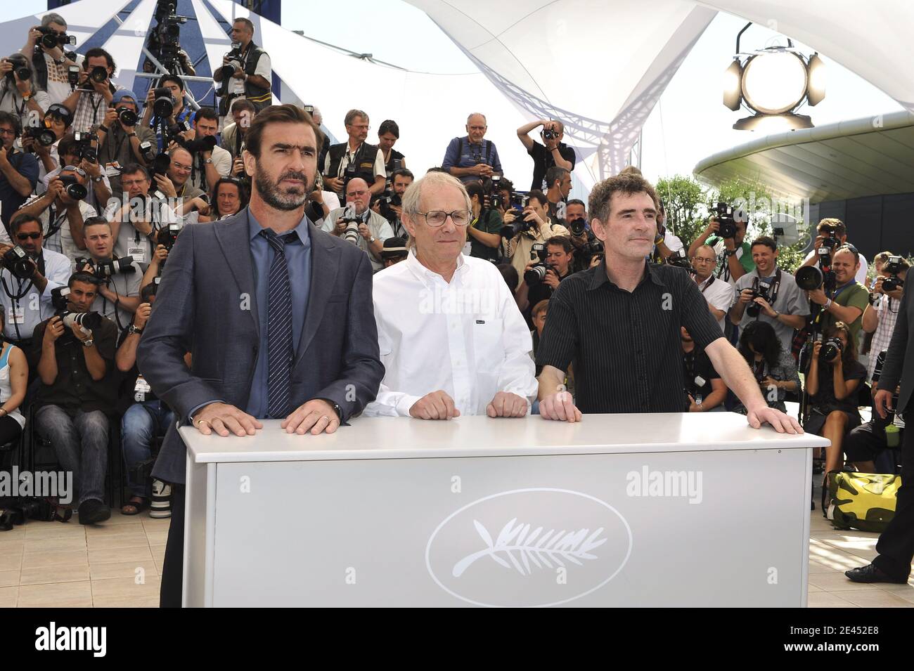 Actor Eric Cantona, director Ken Loach and actor Steve Evets attend the ...