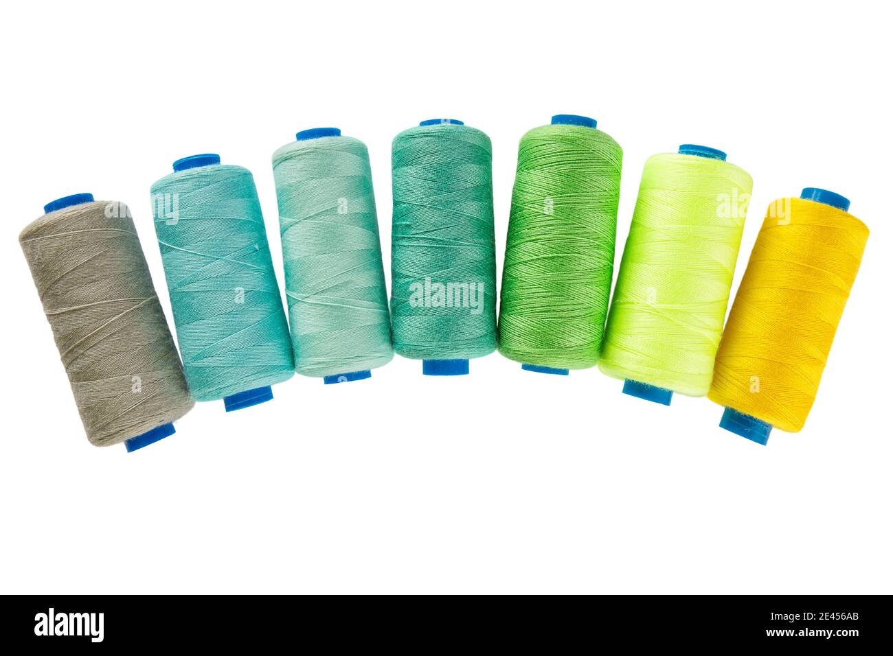 set of multi-colored sewing threads in coils, isolate on a white ...