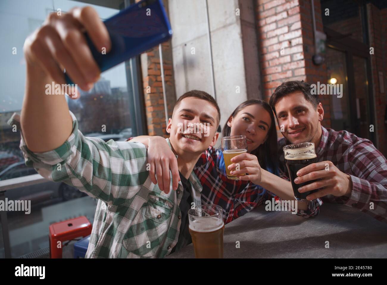 Pub drinking ale young men hi-res stock photography and images - Alamy