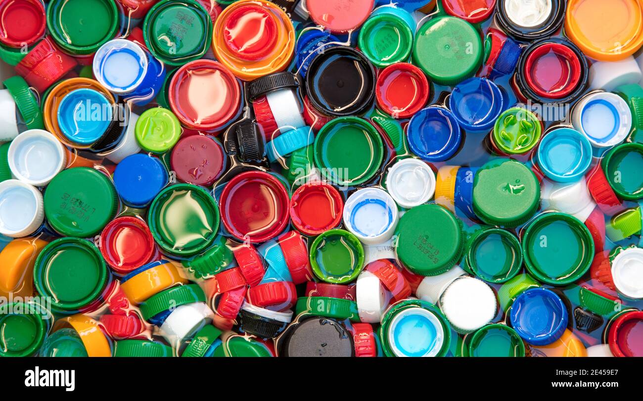 High angle shot of colorful plastic lids for recycling in a bunch Stock ...