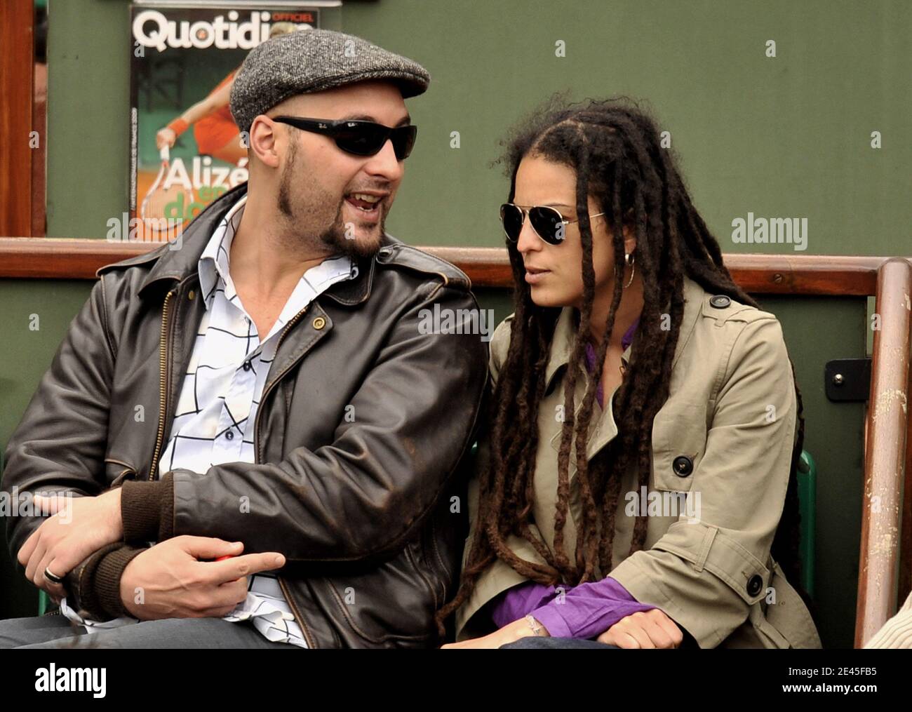 French singer Anis and his wife attend the 2009 French Tennis Open at ...