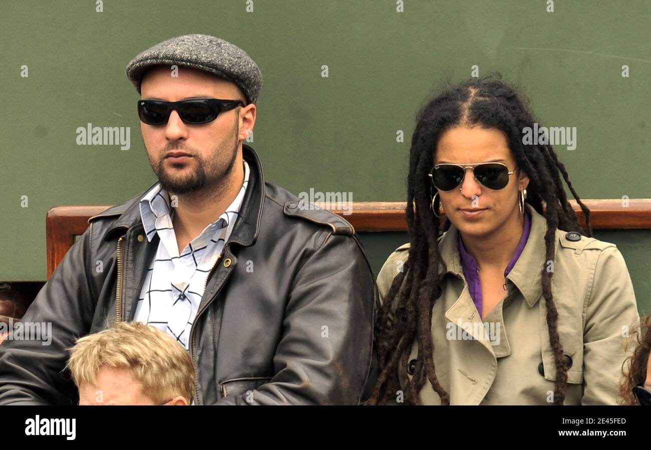 French singer Anis and his wife attend the 2009 French Tennis Open at ...