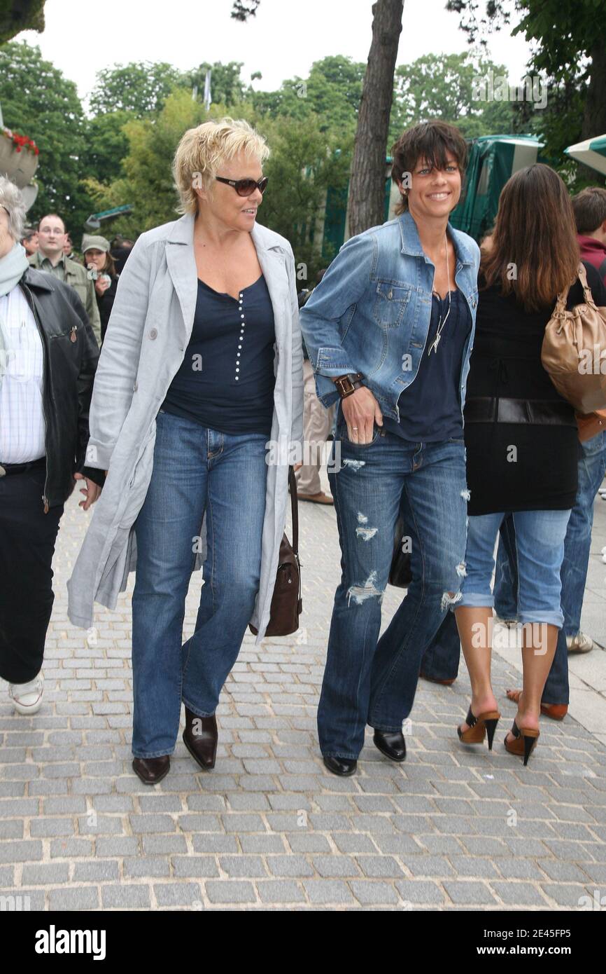 French humorist Muriel Robin and her girlfriend Anne arriving at the ...