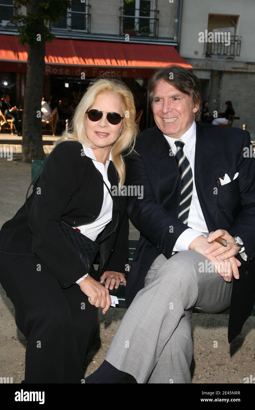 Sylvie Vartan and her husband Tony Scotti attend the opening of Photographer Jean-Marie Perier's ...