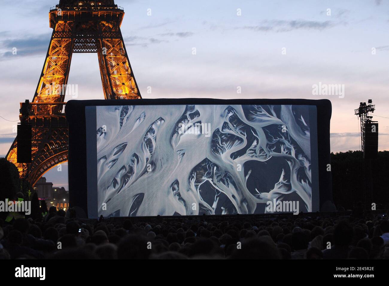 People watch French photographer Yann Arthus-Bertrand's movie 'Home' on ...