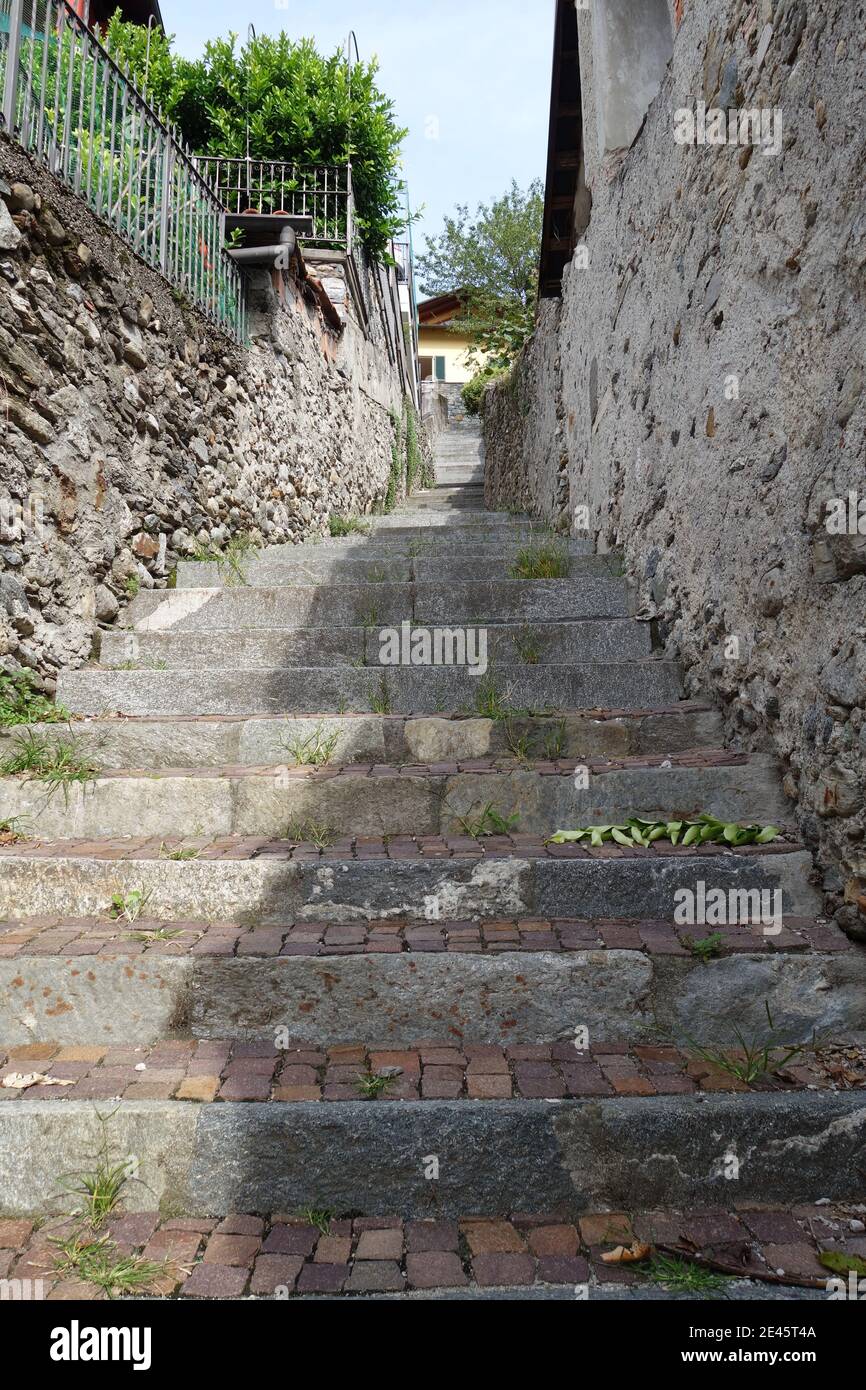 Vertical shot of stairs between walls Stock Photo - Alamy