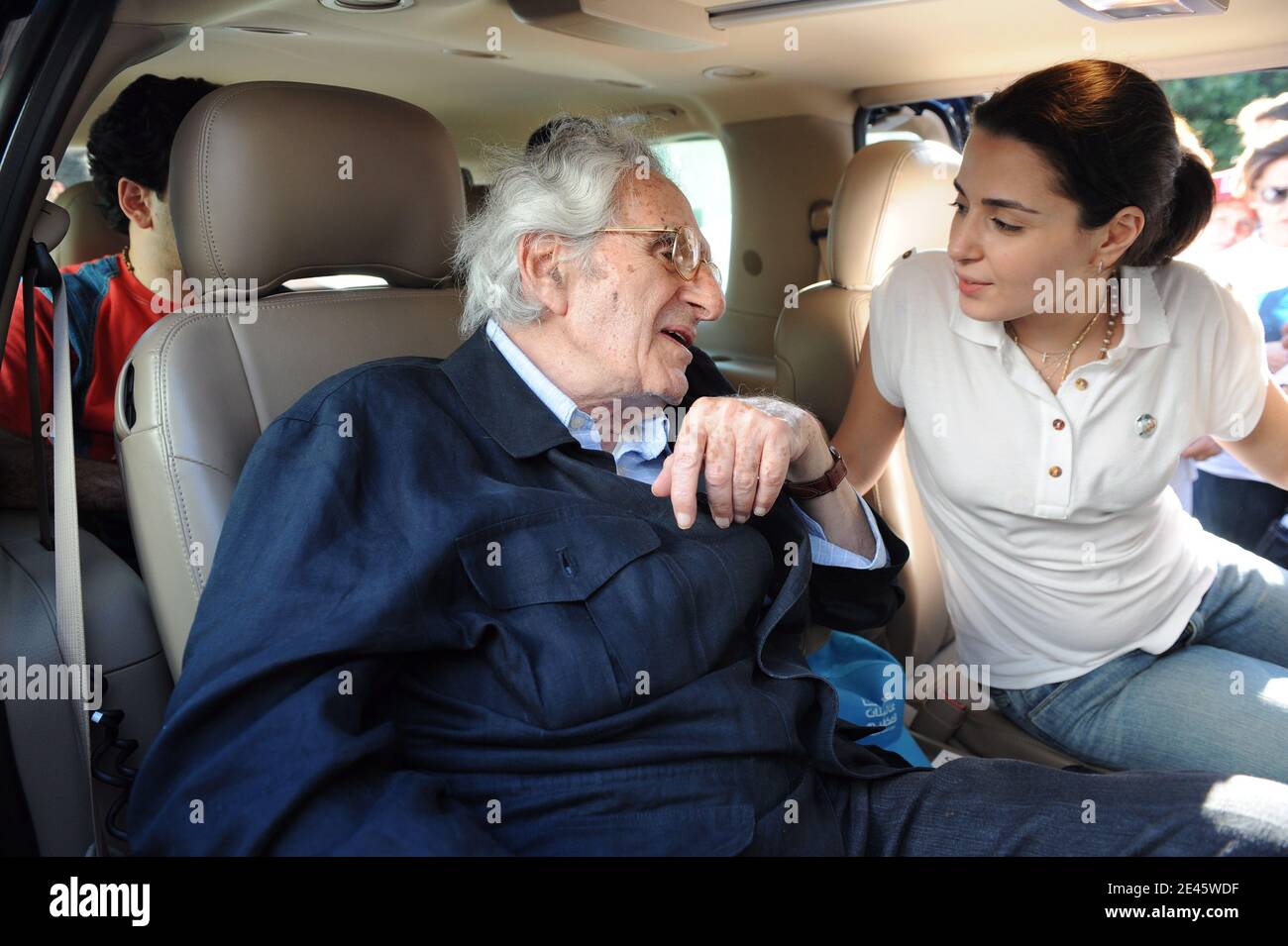 27 year-old Nayla Tueni (R) kisses her grandfather journalist and ...
