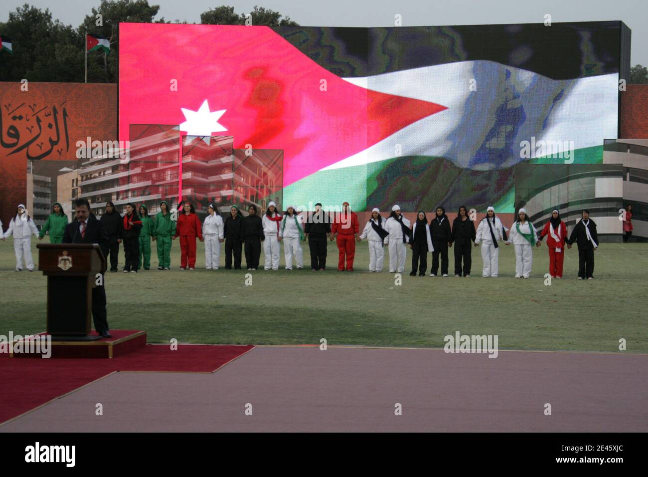 Performers seen during a ceremony in the Amman stadium, in Amman ...