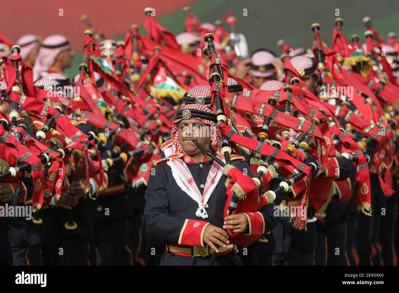 Performers seen during a ceremony in the Amman stadium, in Amman ...