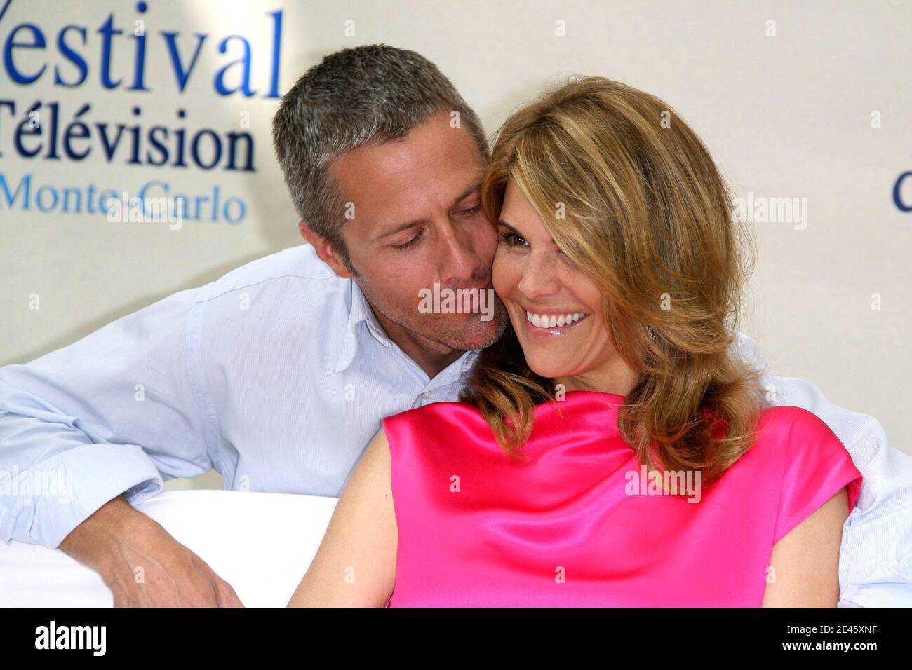 Actress Lori Loughlin And Actor Rob Estes Arrive At A Photocall For The ...