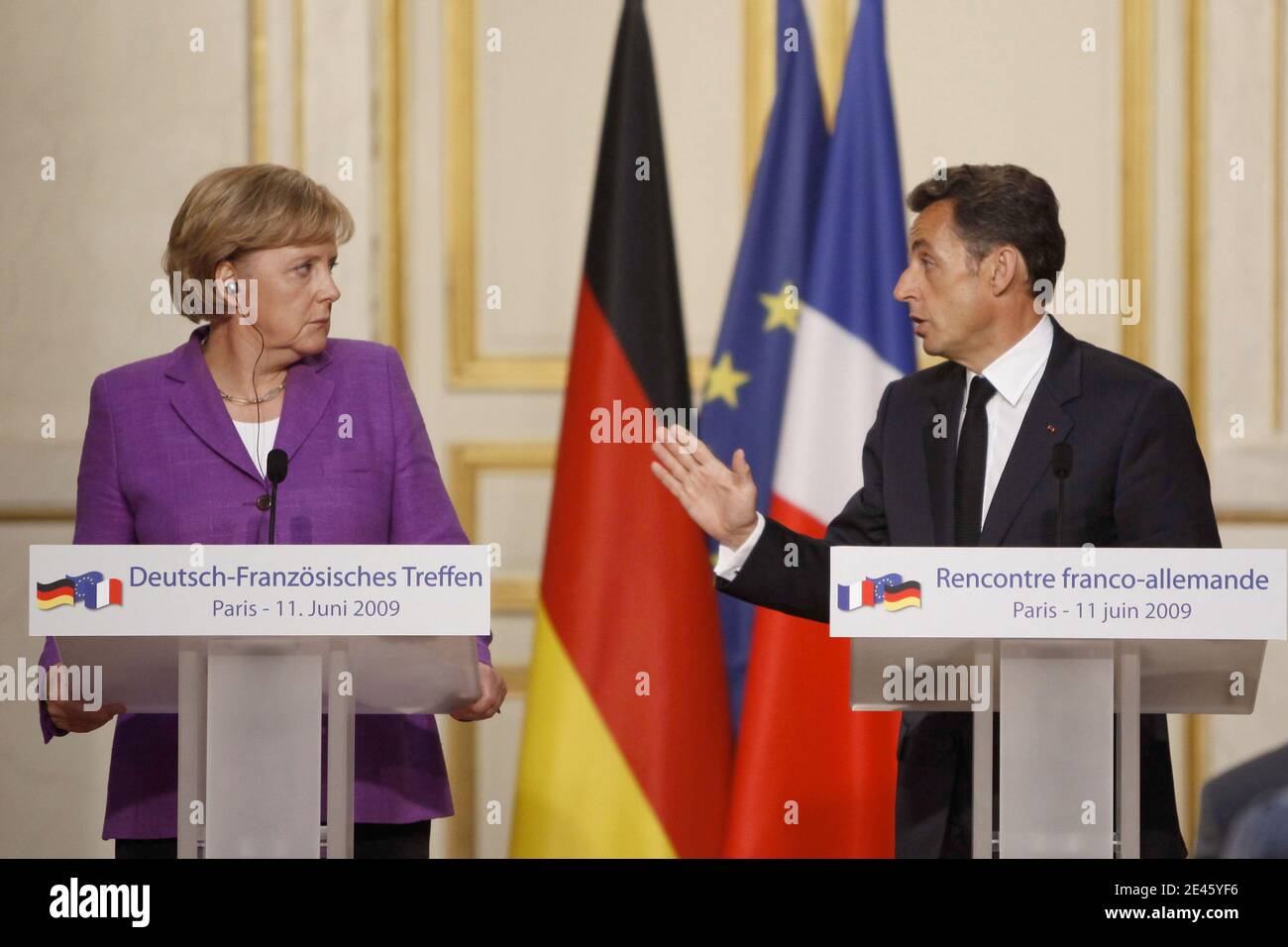 French President Nicolas Sarkozy and German Chancellor Angela Merkel ...