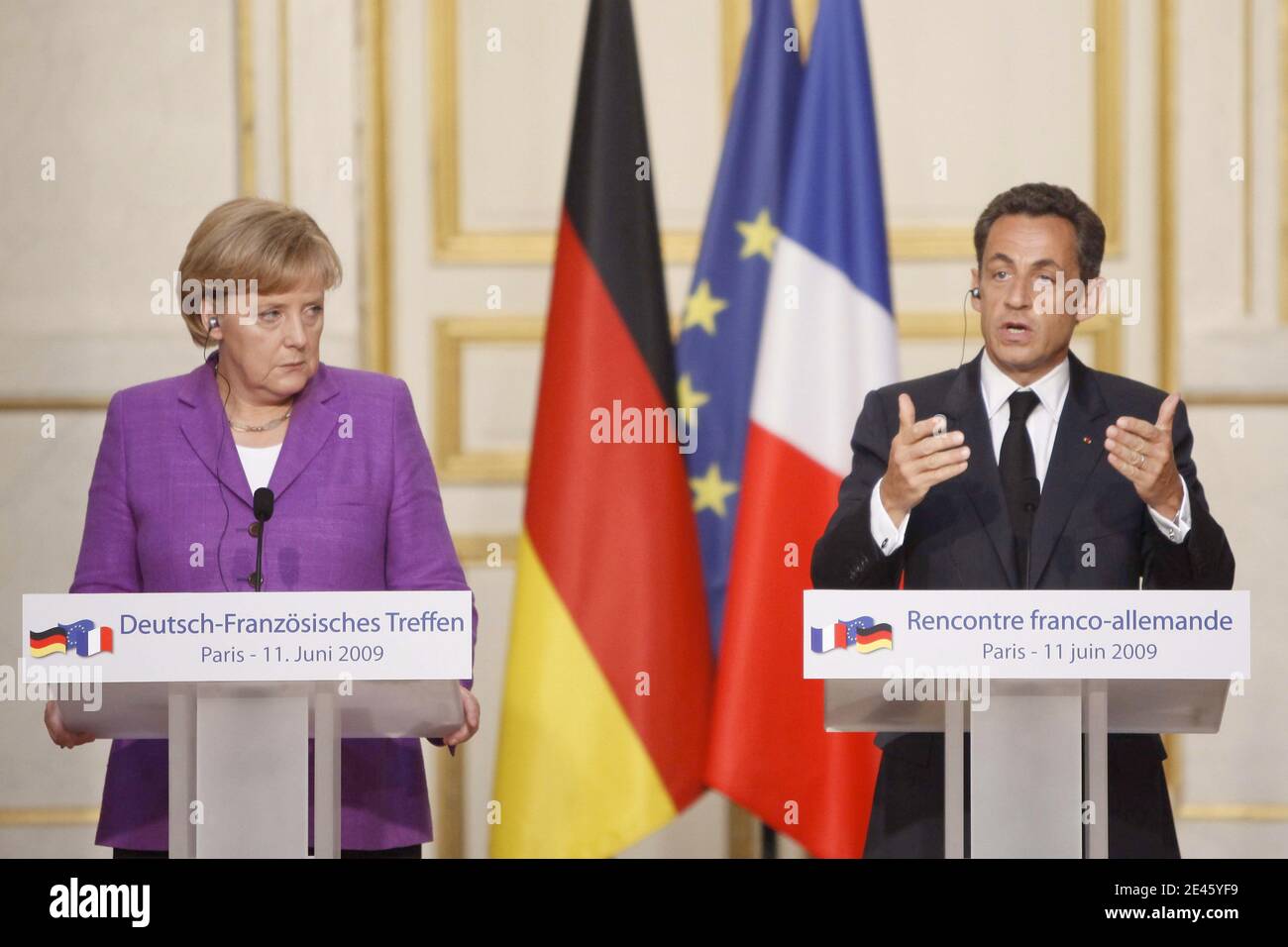 French President Nicolas Sarkozy and German Chancellor Angela Merkel ...