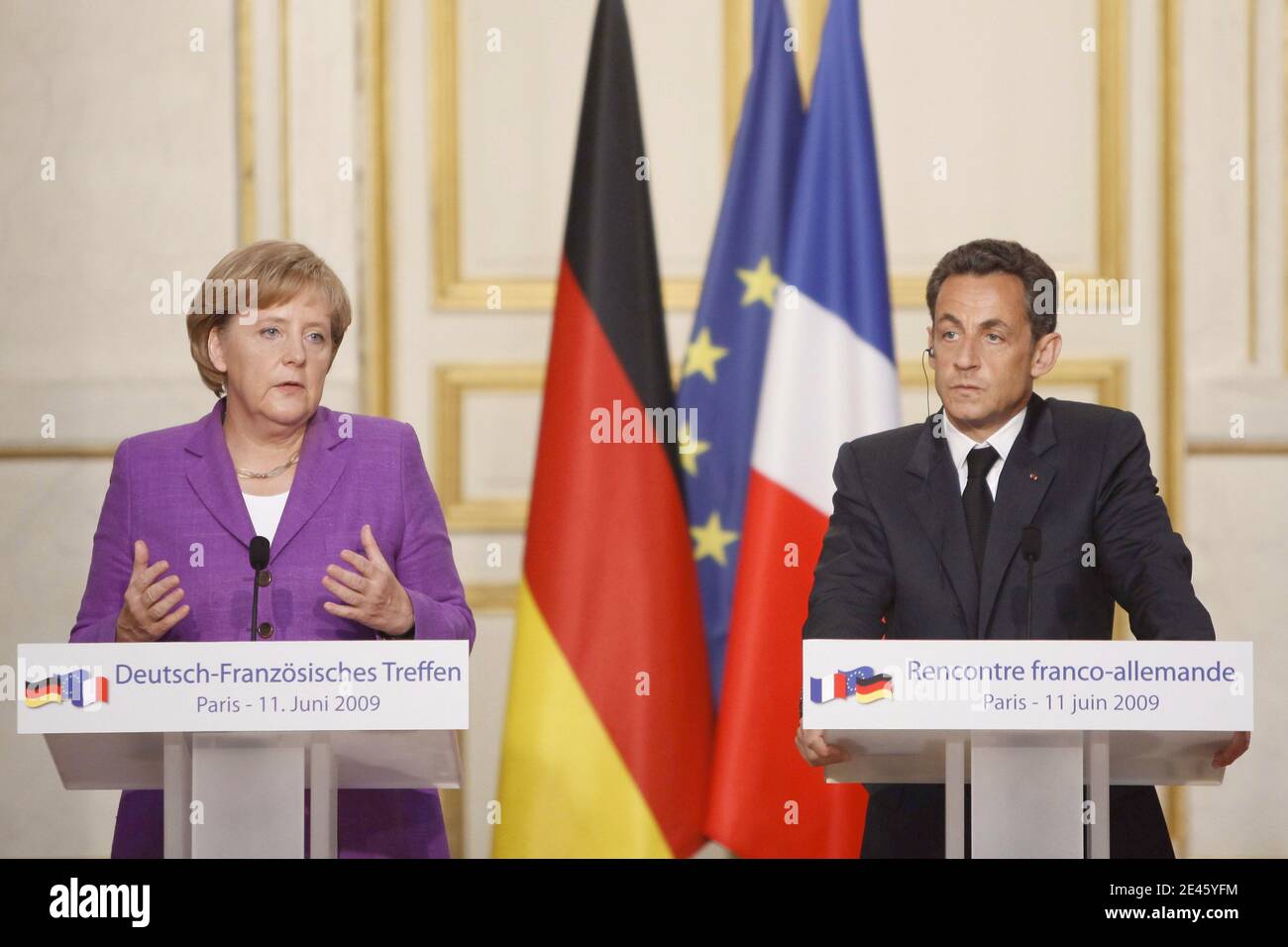 French President Nicolas Sarkozy and German Chancellor Angela Merkel ...