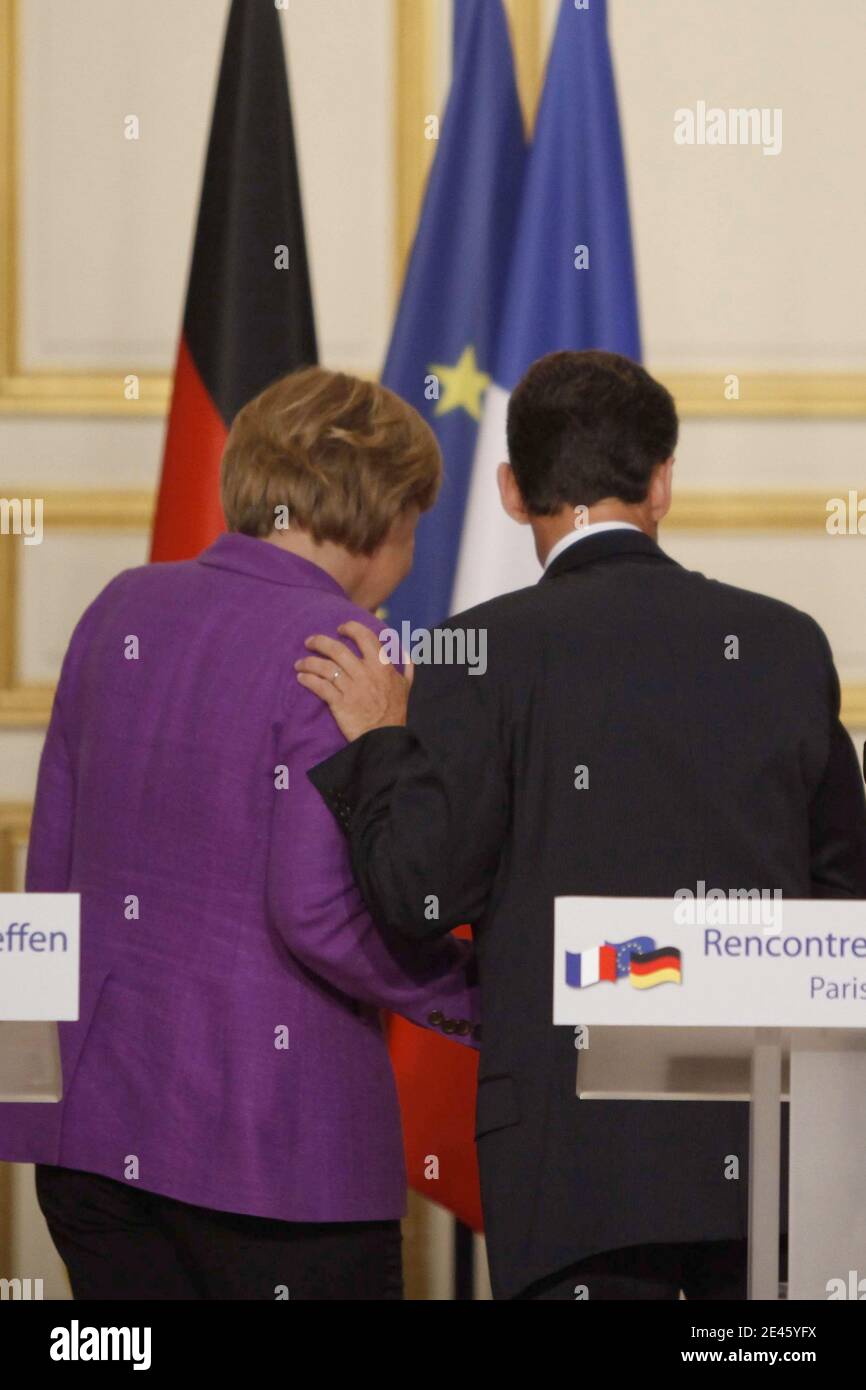 French President Nicolas Sarkozy and German Chancellor Angela Merkel ...