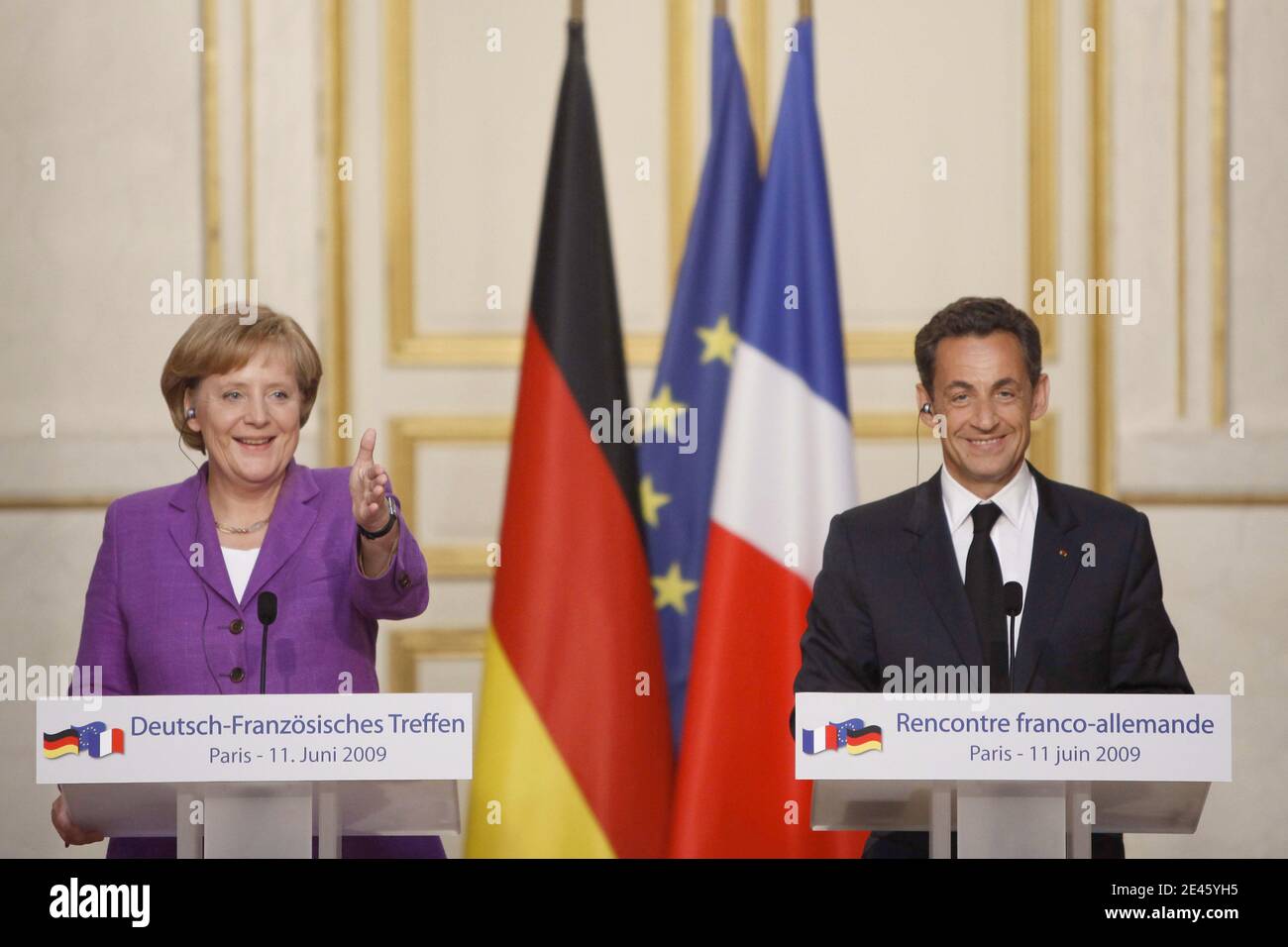 French President Nicolas Sarkozy and German Chancellor Angela Merkel ...
