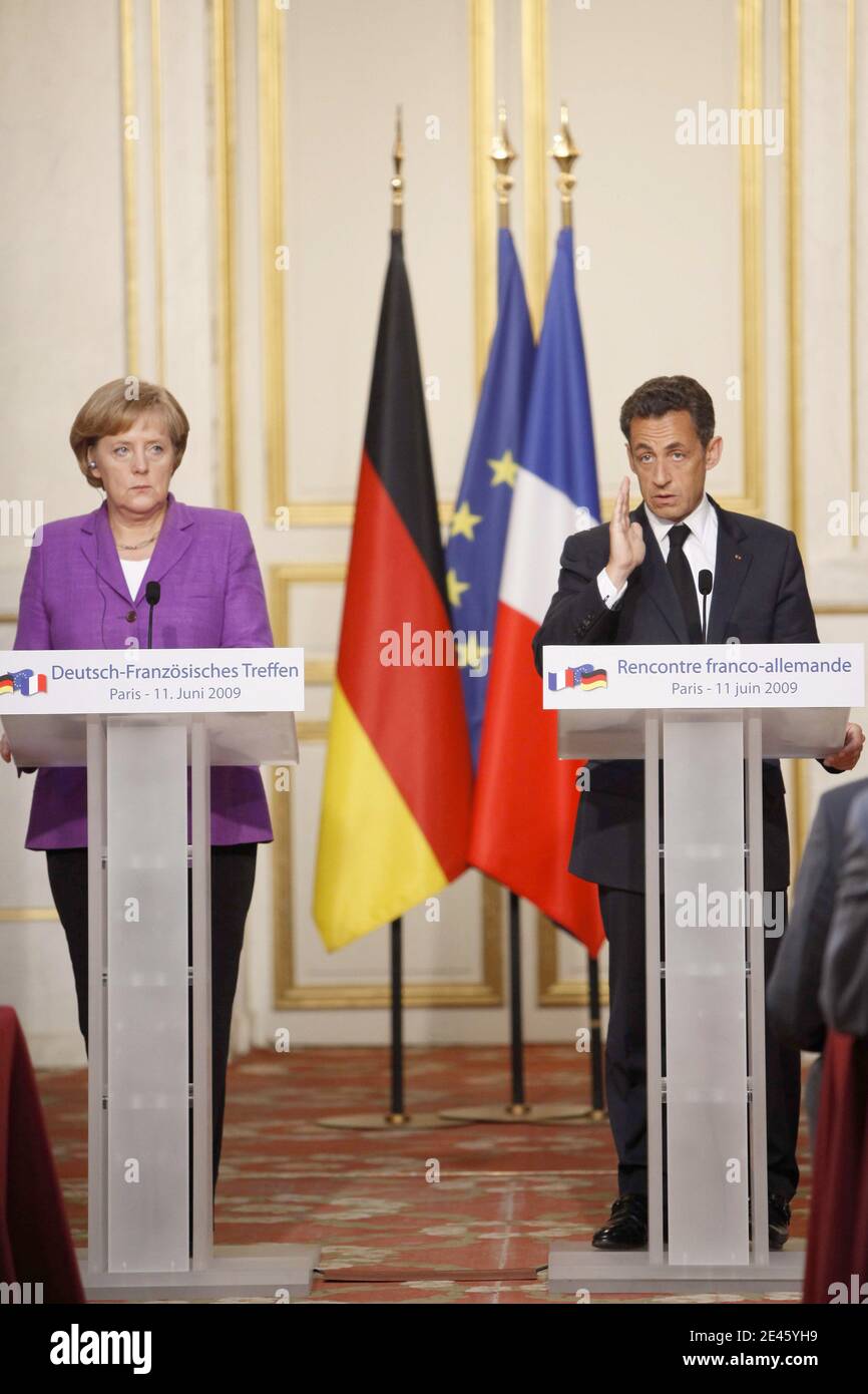 French President Nicolas Sarkozy and German Chancellor Angela Merkel ...