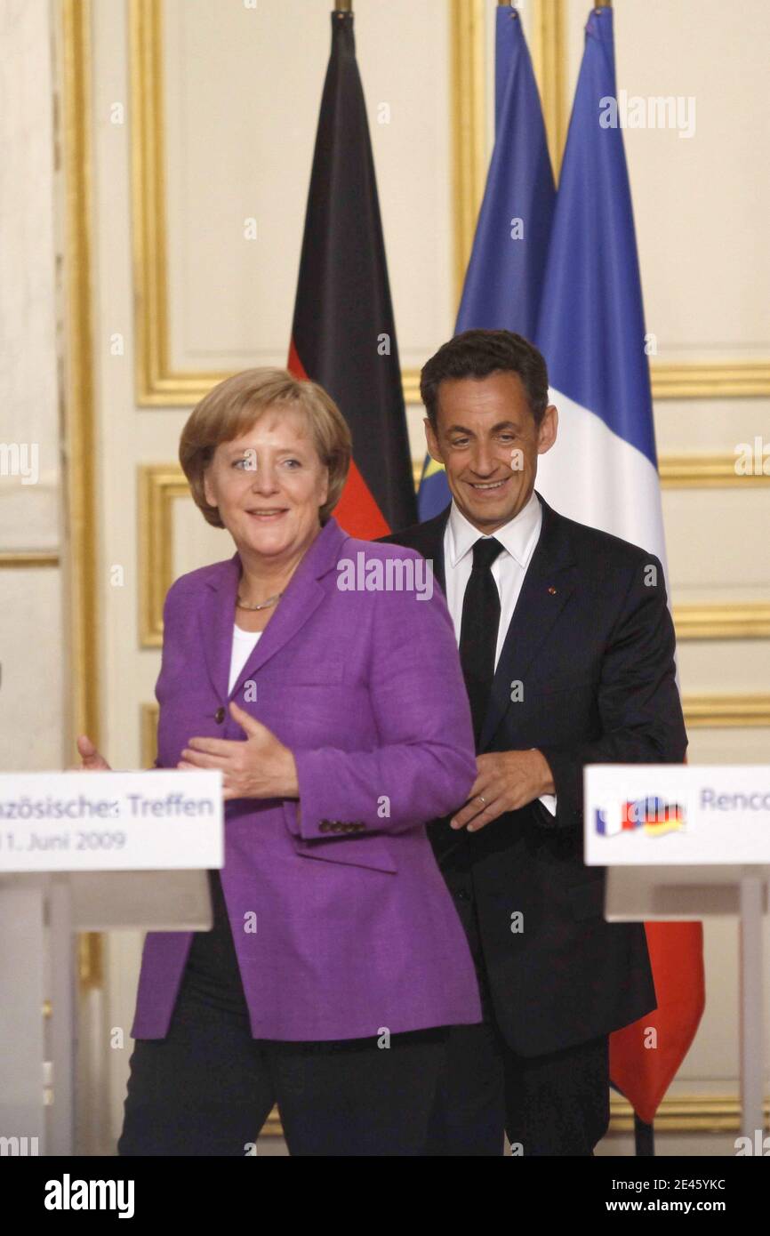 French President Nicolas Sarkozy and German Chancellor Angela Merkel ...