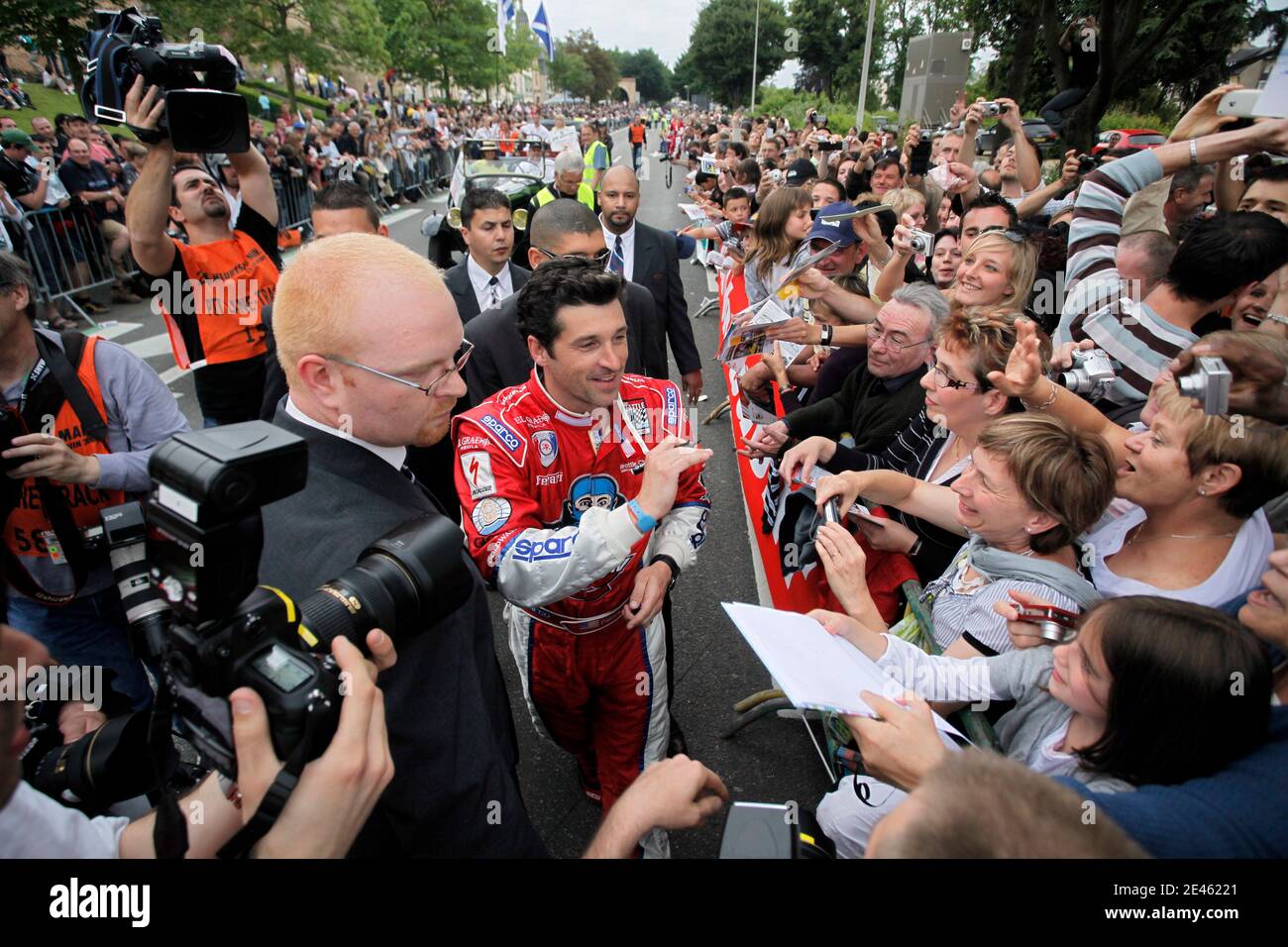 Actor Patrick Dempsey signs autographs to his numerous fans during the ...