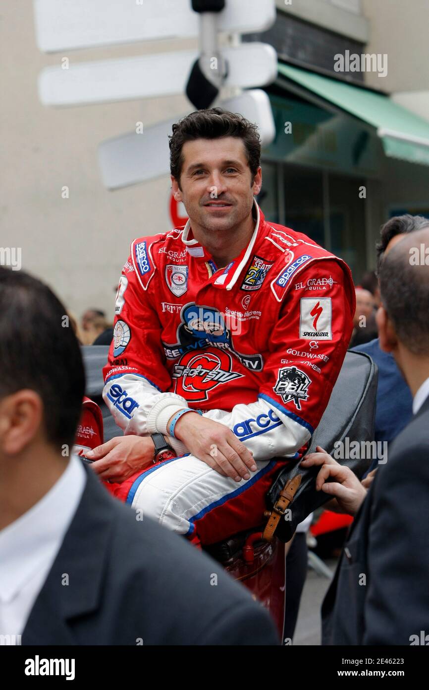 Actor Patrick Dempsey signs autographs to his numerous fans during the ...
