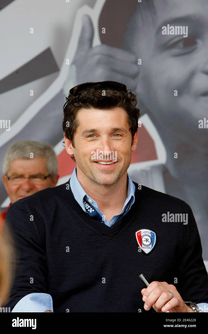 Actor Patrick Dempsey signs autographs to his numerous fans during the ...