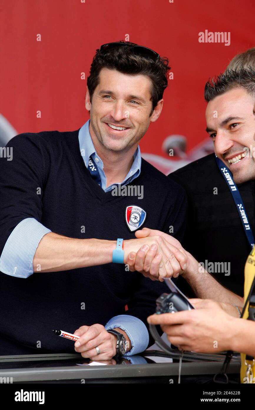 Actor Patrick Dempsey signs autographs to his numerous fans during the ...